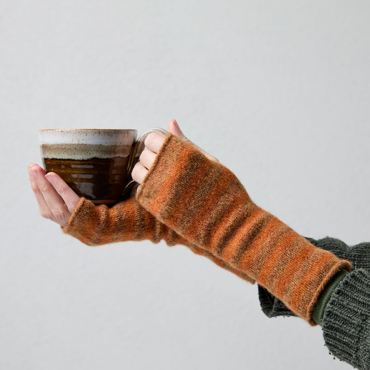 Striped wrist warmers in Rust and Zinc – Anna-Lisa Smith